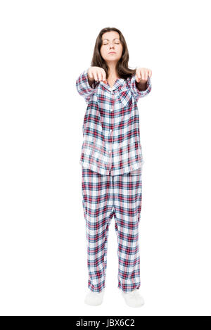 young sleepwalking woman in pajamas isolated on white background Stock ...