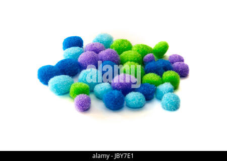 A collection of colorful craft pompoms various colors up close Stock ...