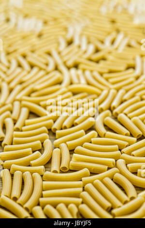 Italian dry pasta covers all over the wooden table Stock Photo - Alamy