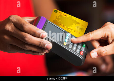 Shopkeeper And Customer Credit Card Swiping On Swipe Machine Product ...