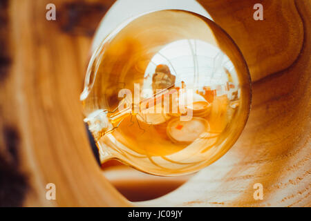Old light bulb stuck in a wooden lamp Stock Photo - Alamy