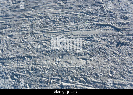 Closeup photo of skis marks on snow slope Stock Photo - Alamy
