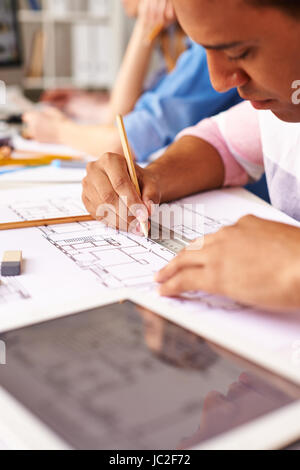 Hands of smart guy making sketch at lesson Stock Photo - Alamy