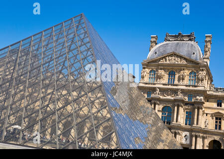 The Louvre Pyramid (Pyramide du Louvre), a large glass and metal ...