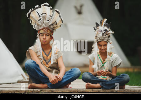 happy children playing native american Stock Photo - Alamy