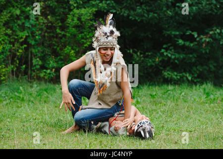 happy children playing native american Stock Photo - Alamy