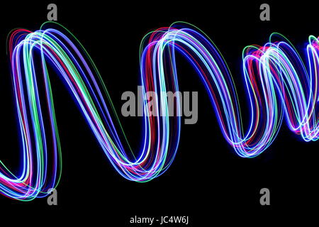 Multi colour Light Painting Photography - swirls and patterns against a ...
