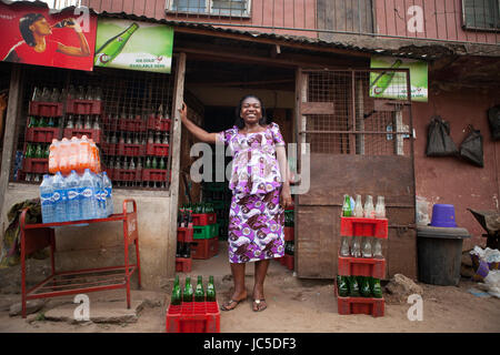 A female shop keeper, Nigeria, Africa Stock Photo - Alamy