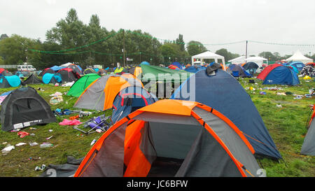 The mess that is left behind after the music festival, abandoned tents ...