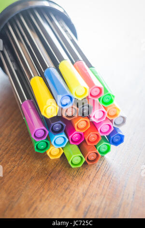 Colorful magic pens on wooden table, stock photo Stock Photo - Alamy