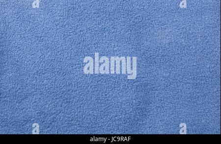 A horizontal background of a blue fabric decorated with silver shiny ...