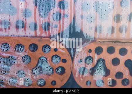 Stack of new silicate bricks with rounded edges in misted torn ...