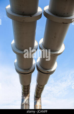 Elevated section of the pipelines against the sky Stock Photo - Alamy