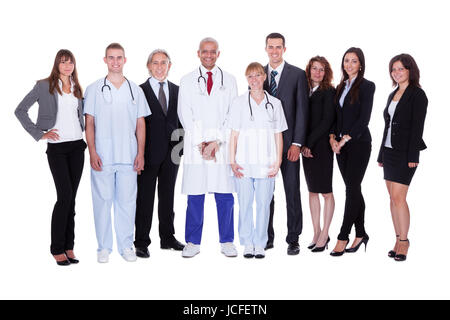 A happy group photo depicting a group of staff people. Isolated on ...