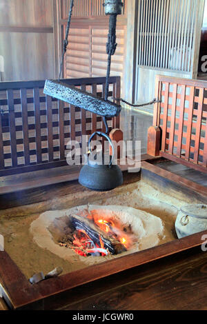 Traditional irori heating a kettle Stock Photo - Alamy