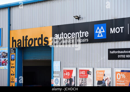Halfords AutoCentre sign Stock Photo - Alamy