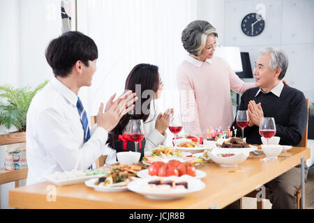 Harmonious family celebrating ceremony Stock Photo - Alamy