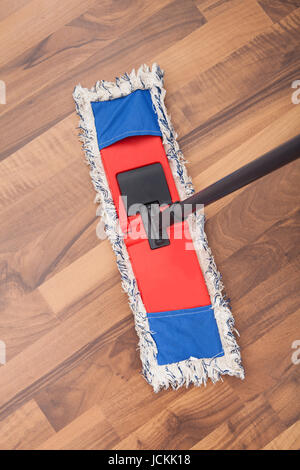High angle view of brush with wipe pads on wooden table Stock Photo - Alamy