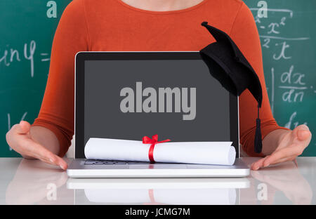 Midsection of caucasian young female teacher with african american ...