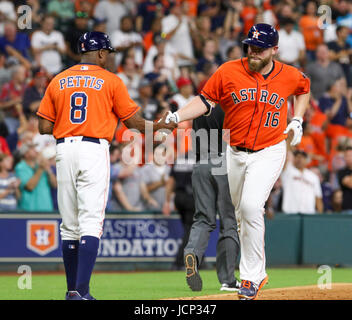 Houston Astros third base coach Tony Perezchica (12) congratulates ...