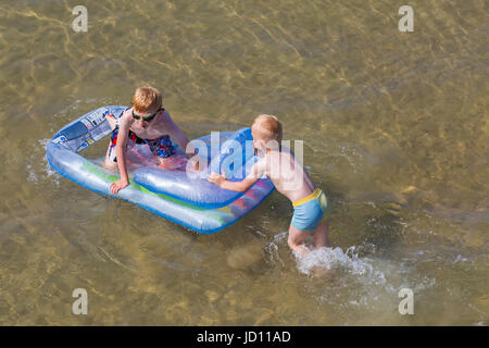 Sinking inflatable dinghy or inflatable boat Stock Photo - Alamy
