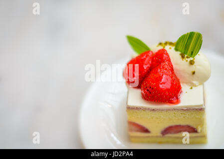 Strawberry Chiffon Entremet cake on white china plate Stock Photo - Alamy
