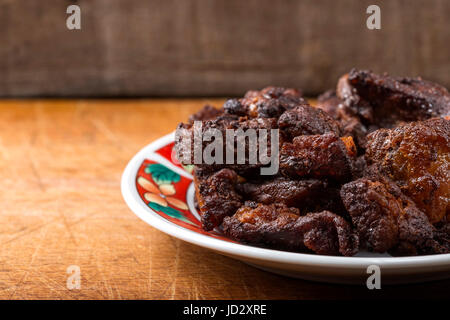 Romanian food called jumeri or greaves on plate Stock Photo - Alamy