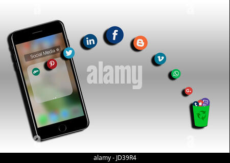 Social media apps falling into a green trash bin on a light grey ...