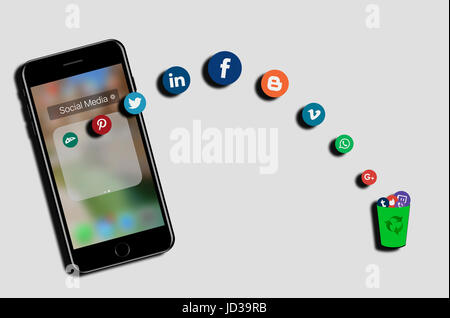 Social media app icons being thrown into a green trash bin, symbolising ...