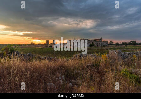 Puglia (Italy) - Wind farm with rock ruins, wind turbines and bales of ...
