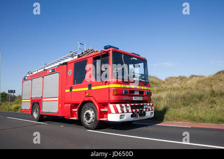 A vintage British Dennis fire engine at the scene of an incident Stock ...