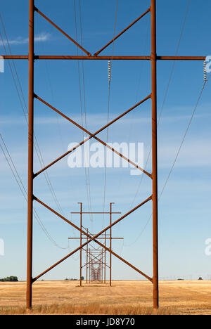 Symmetrical high voltage electricity poles in Turkey Stock Photo - Alamy