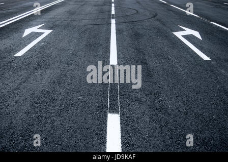 Road marking with a right turn arrow and a straight arrow Stock Photo ...