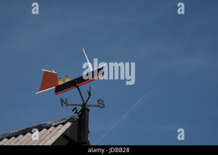 Weather vane - Blue boat - against the blue sky Stock Photo - Alamy