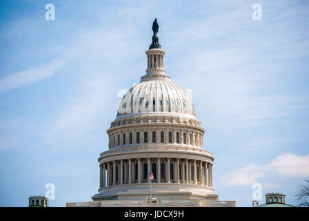 U.S. Capitol Building close-up. American Flag Flying with Capitol ...