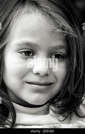 Closeup shot of a cute white and brown Beagle breathing heavily with an ...