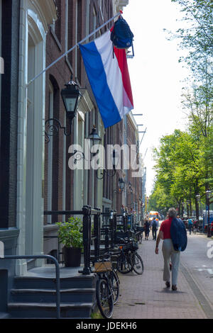 A dutch flag with a school bag in top to celebrate graduation Stock ...