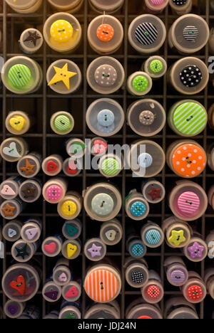 Tubes of buttons Stock Photo - Alamy