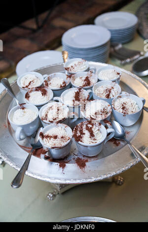 coffe cup with cream on a tray Stock Photo - Alamy