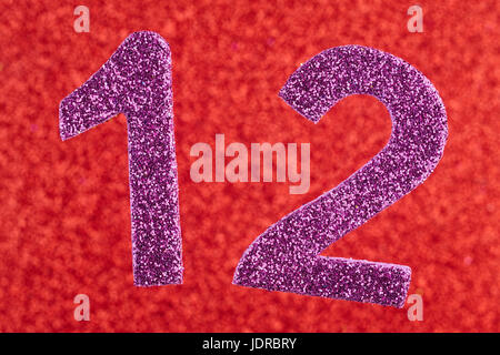 Number twelve purple color over a purple background. Anniversary ...