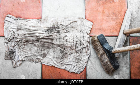 Dirty doormat lies on the pavement slab closeup Stock Photo - Alamy