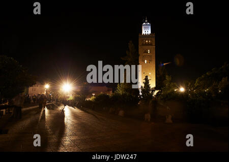 Clock tower lit up at night against blue sky, Bruegge, Belgium Stock ...