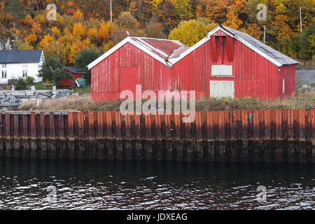 Traditional Norwegian red wooden barns on the sea coast Stock Photo - Alamy