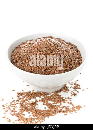 Brown linseed on a bowl over wooden table Stock Photo - Alamy