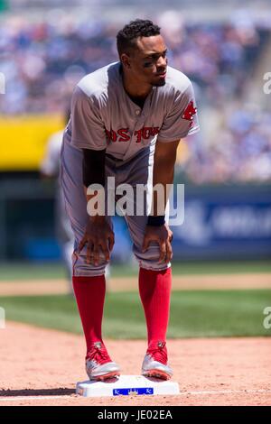 Mookie Betts of the Boston Red Sox hits a double against the Boston Red ...