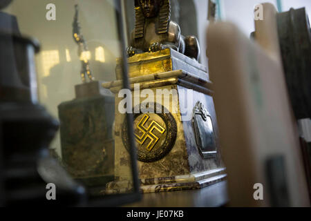An Egyptian sphynx with the swastika can be seen at the Interpol ...