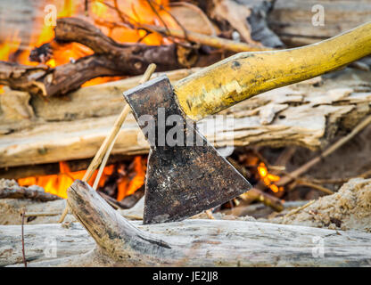 A small fire on the sandy river bank close-up Stock Photo - Alamy