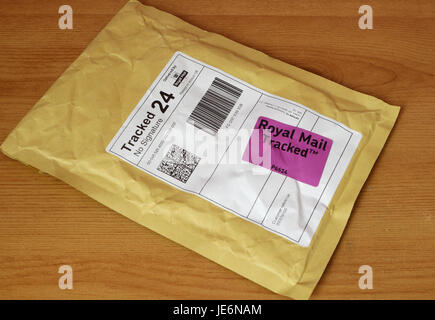 Royal Mail Tracked 24 no Signature Label on a Cardboard Package Stock ...