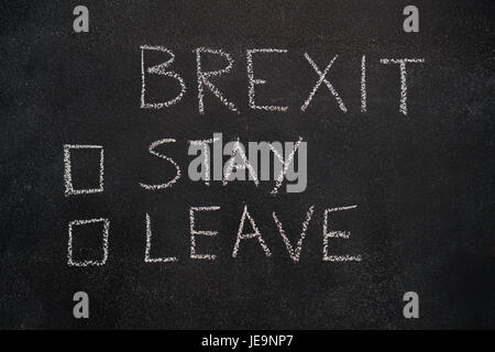 Brexit stay or leave written with white chalk on blackboard Stock Photo ...