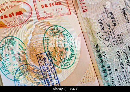 Chinese stamp on passport Stock Photo - Alamy